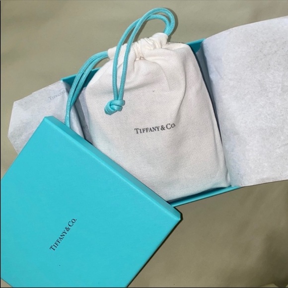 Tiffany & Co. | Bags | Tiffany Co Wave Leather Small Zip Around Wallet ...